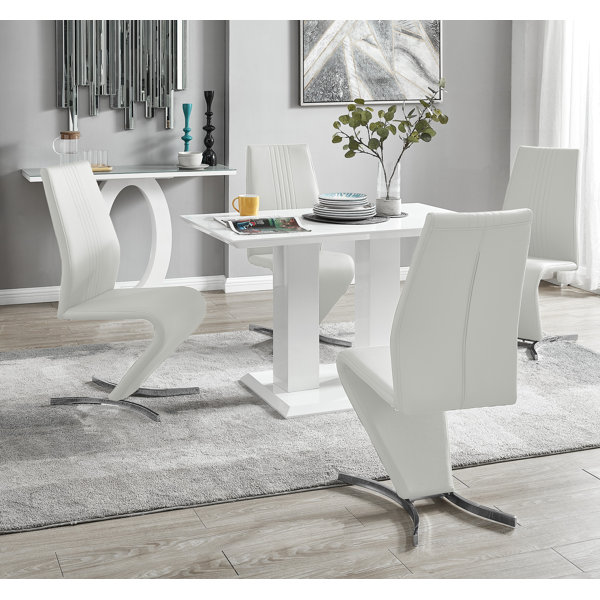 East Urban Home Eubanks High Gloss Double Pillar Dining Table Set with 4 Luxury Faux Leather ...